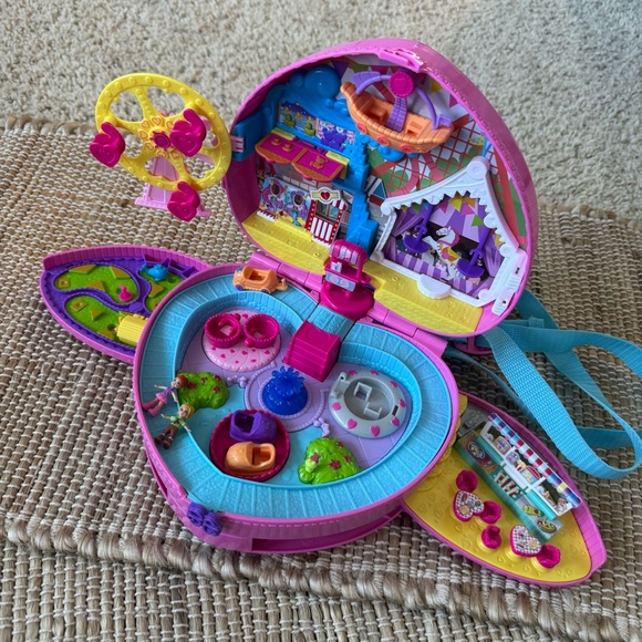 polly pocket | Toys | Polly Pocket Tiny Is Mighty Theme Park Backpack ...